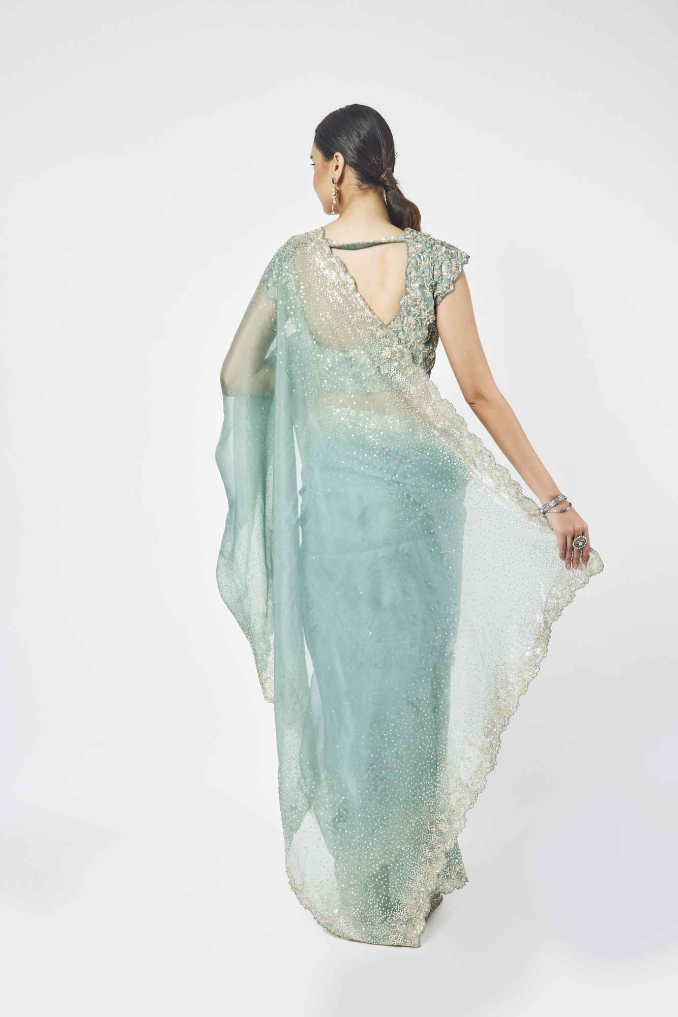 Fern Green Organza stone and cutdana work saree